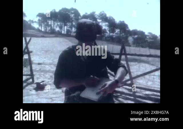United States Army combat artists sketch a tracking station and supply ...