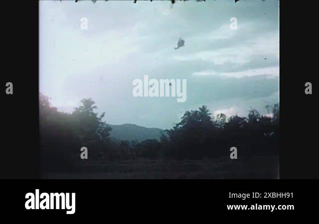 1960s - Helicopters drop off men from the 1st Air Cavalry Division in a ...