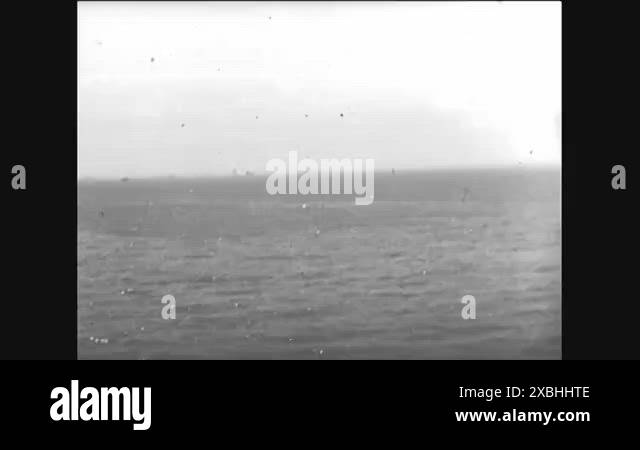 1944 - Soldiers board attack boats from battleships, headed for ...