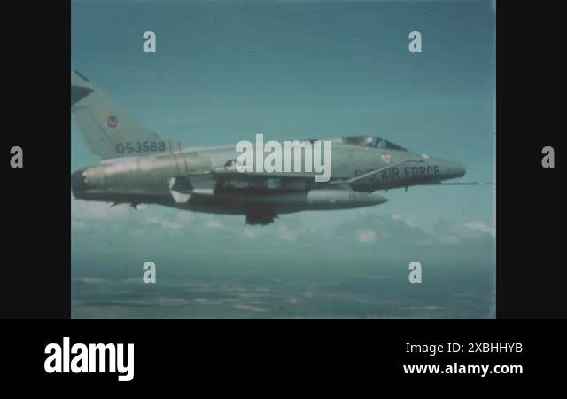 1965 - A USAF plane lands on an airstrip in Vietnam, as filmed from ...