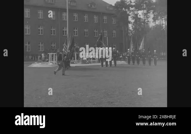 1952 - 26th Infantry Division soldiers place gold eagles at the top of ...