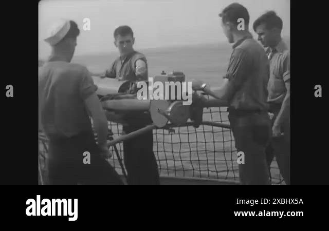 1951 - US Navy sailors test an airplane motor on deck of the USS Los ...