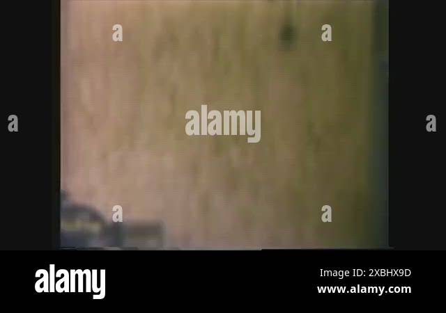 1979 - A bank teller helps a shady customer with a transaction and ...