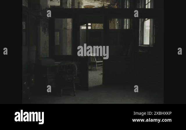 1989 - Various waiting rooms at Ellis Island are shown, as narrator ...