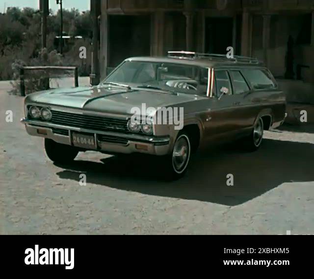 1965 - A row of modern station wagons is compared to wagons from the ...
