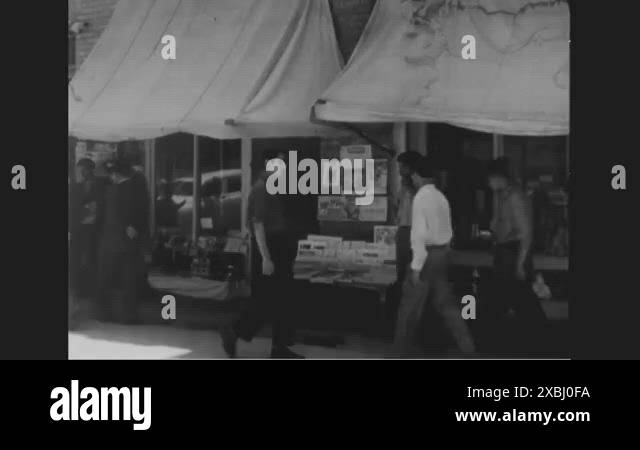 1952 - Soviet propaganda is sold on the sidewalks in Tehran Stock Video ...