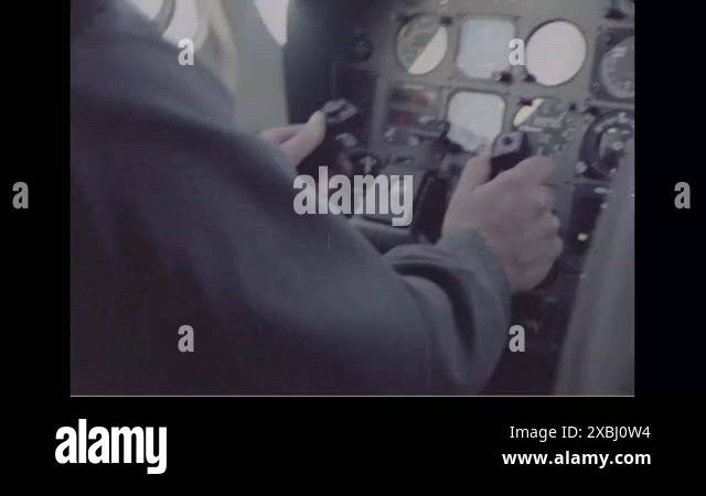 1984 - An aircraft pilot's control panel is shown as he steers Stock ...