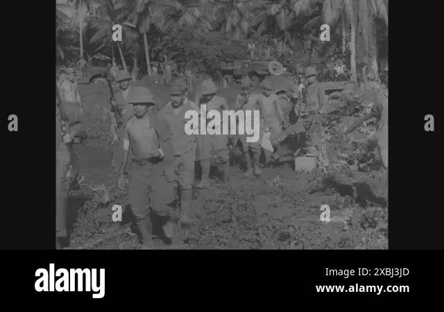 1944 - Having won the Battle of Guam, Marines round up Japanese ... 1944 - Having won the Battle of Guam, Marines round up Japanese ...