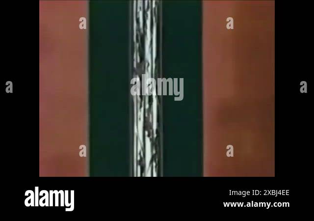 1961 - Animation is used to show damaged fuel rods being pulled from a ...