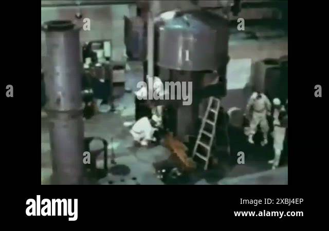 1961 - Animation is used to show how gas valves in a sodium reactor ...