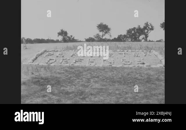 1952 - A panorama shows activity at Camp Roberts. An outdoor class on ...