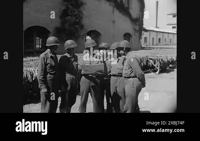 1943 - Major General Walker and his men review a map in Salerno ...