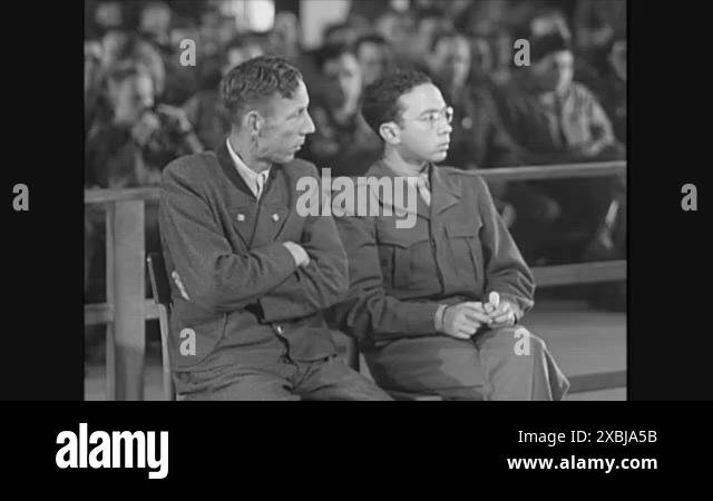 Nazi defendants testify in a courtroom during war crimes trials at ...