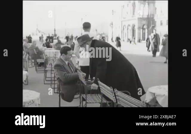 Soldiers are shown at a sidewalk cafe and General John Pershing and the ...