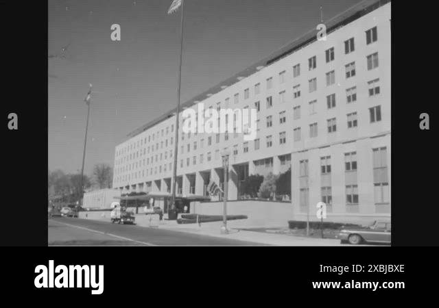 1963 - Carl Rowan's family proudly looks on as he is sworn in as ...