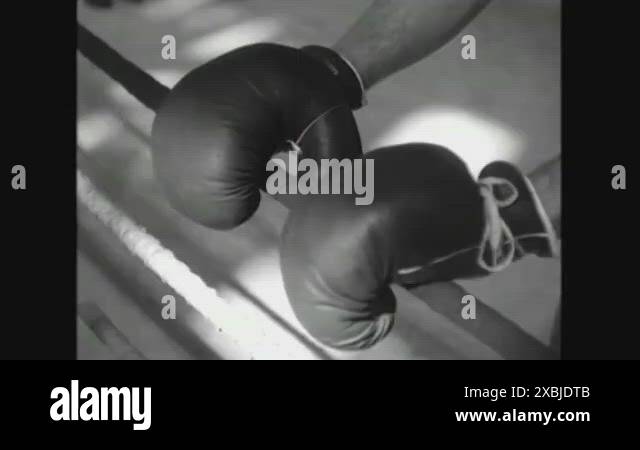 1945 - US Army boxing coaches work with black and white soldiers ...