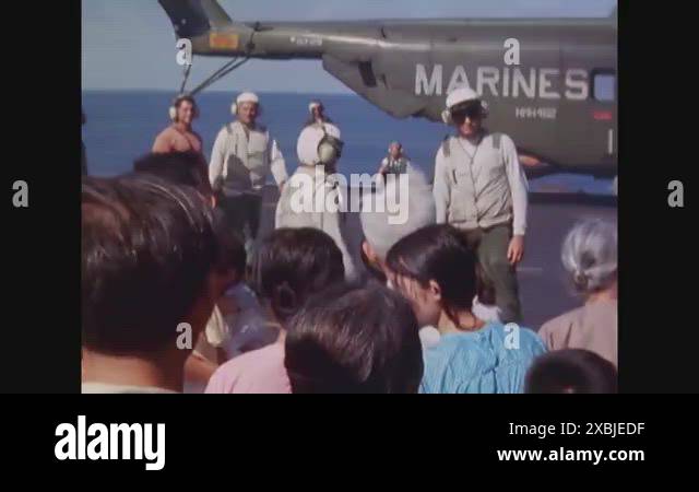South Vietnamese evacuees board a United States Marines Corps ...