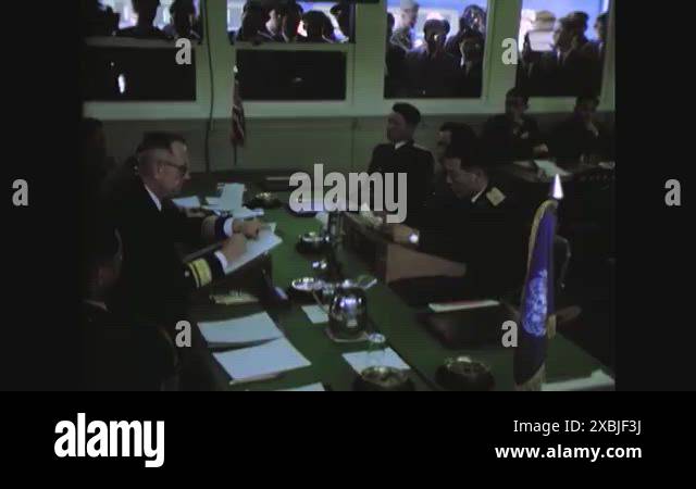 American and Korean officers meet in a conference at the United Nations ...