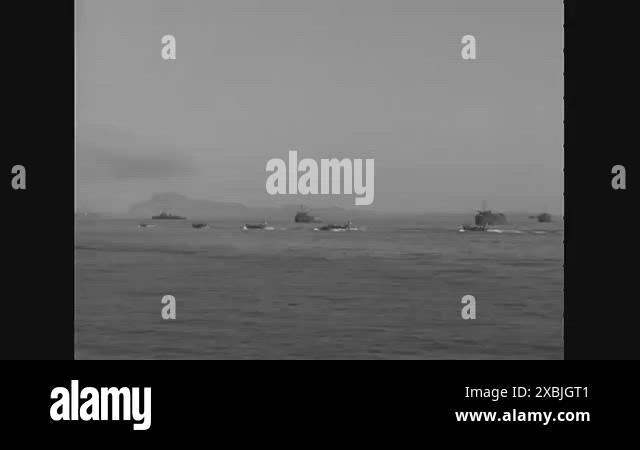 1944 - US Navy Landing Crafts head towards the burning Leyte Islands ...