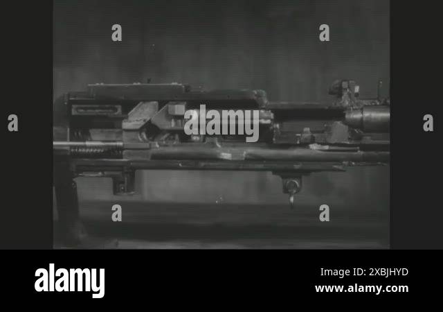 1943 - A gas-operated Japanese machine gun is partially opened, so the ...