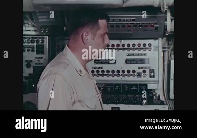 1970 - Officers in the control room and using the intercom aboard the ...