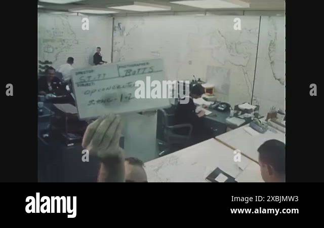 1966 - An interior view shows US Navy officers working at the ASW ...