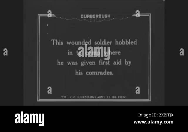 1915 - A wounded German soldier is treated at an army campsite. The ...