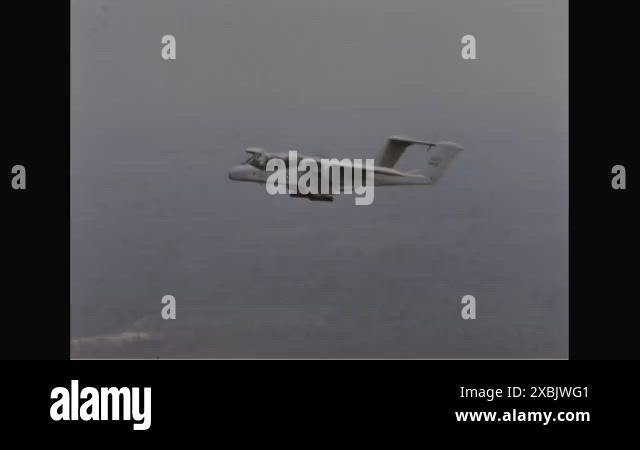 1968 - A Forward Air Controller takes note of the terrain below him on ...