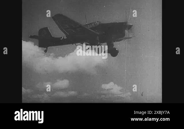 1941 - A dive bomber is shown and an animated map shows the conquest of ...