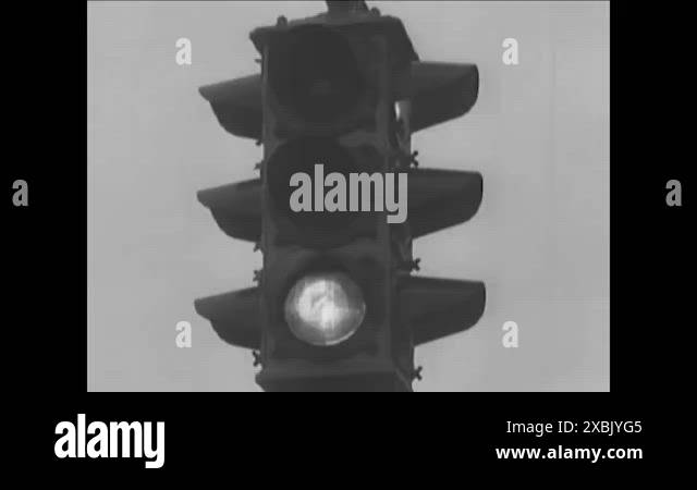 1937 - A traffic light is opened up, and the functions of its gears ...