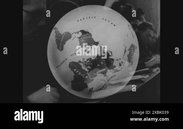 1943 - An animated map and globe and an oilfield, lumber, mining and ...