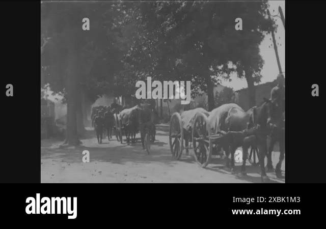 1918 - The 319th Field Artillery Regiment marches and travels in horse-drawn wagons toward the ...