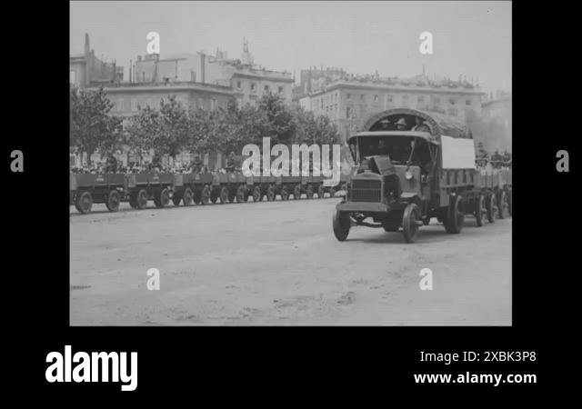 1918 - Men of the French armed forces drive military vehicles in a ...