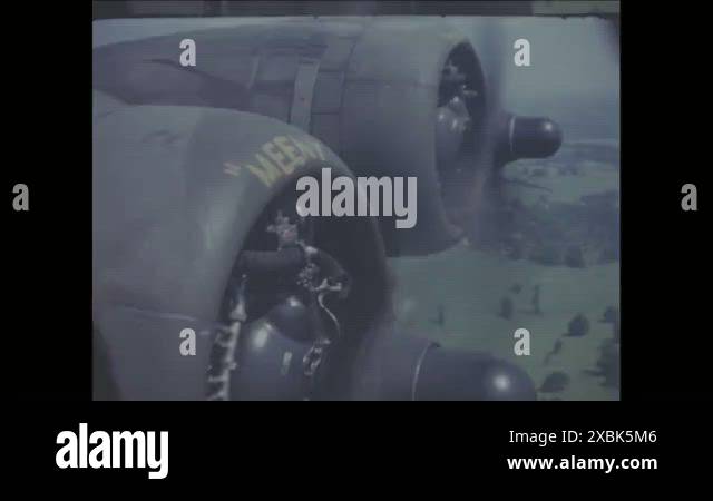 1943 - Footage shot from a B-17 shows the plane's propellers; a ...