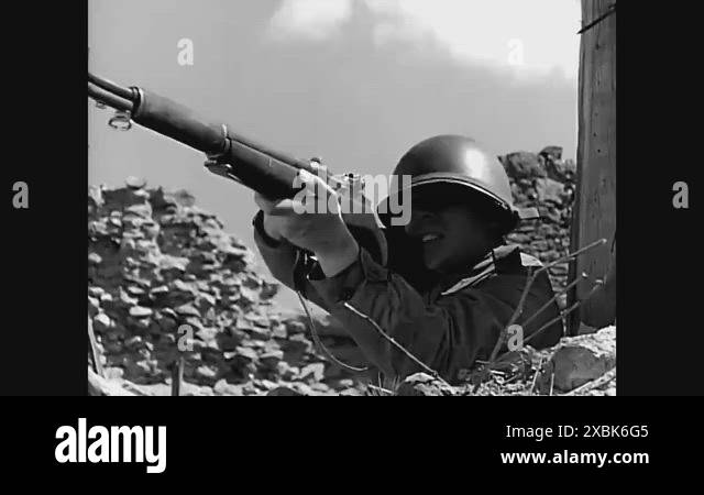 1950s - American soldiers from the 2nd Armored Division practice a mock ...