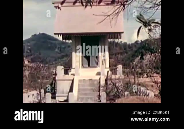 1945 - A shrine is shown as well as a wrecked building and rubble in ...
