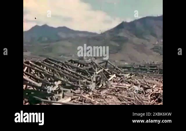 1945 - Damaged and collapsed buildings are shown in the aftermath of ...