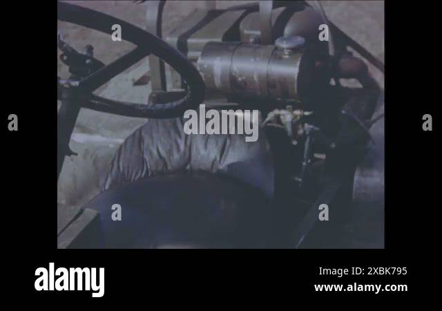 1943 - A fuel truck is shown next to the Memphis Belle warplane and ...