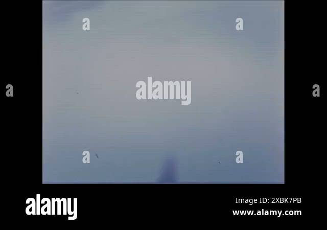 1943 - Footage shot from a B-17 gun turret captures the action as ...