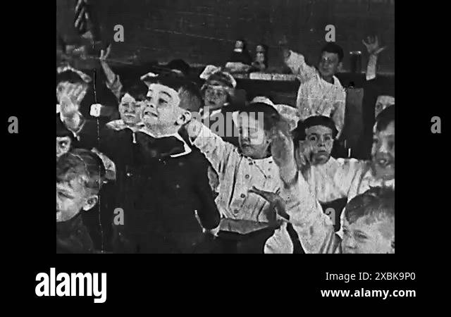1928 - Excited children are shown in a grammar school classroom Stock ...