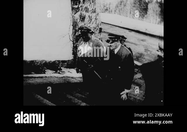 1938 - Adolf Hitler confers with officers and Nazi troops march into ...