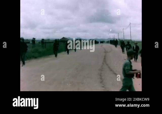1966 - Helicopters drop off equipment in the field for men of the 25th ...