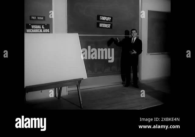 1962 - A civilian instructor shows Army Information School students how ...