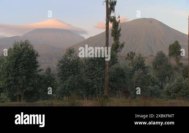 A strange cloud formation forms at the summit of the Virunga volcano ...