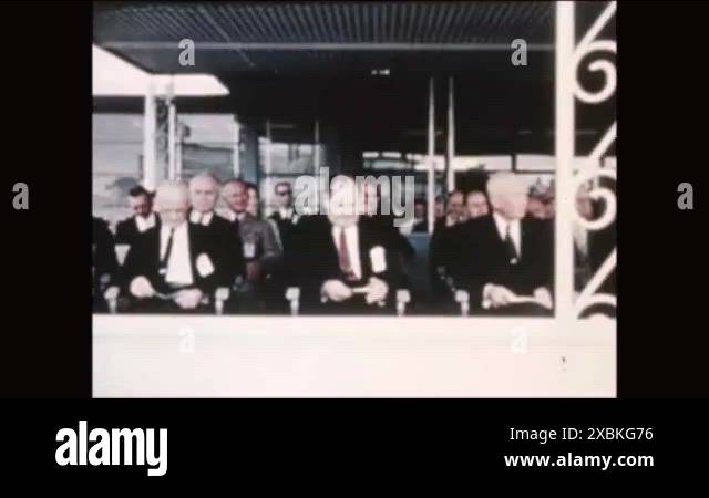 President Dwight D. Eisenhower listens as Governor John Patterson ...