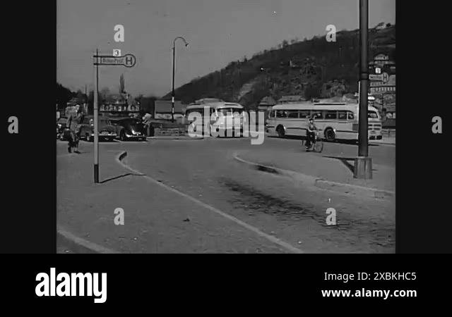 A tour bus is shown as well as soldiers on leave sightseeing in Germany ...