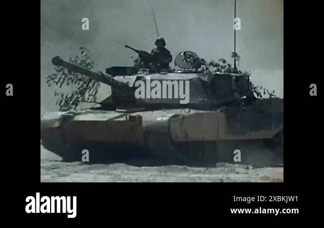 An attack helicopter is flown and an M1 Abrams battle tank is shown as ...