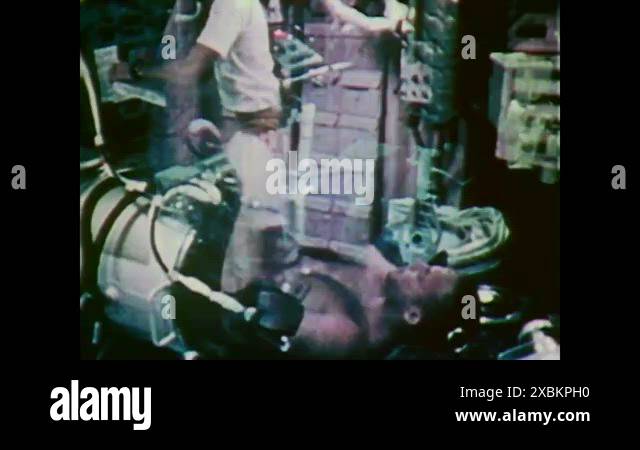 Astronauts are weighed and a rotating chair is used to test balance in ...