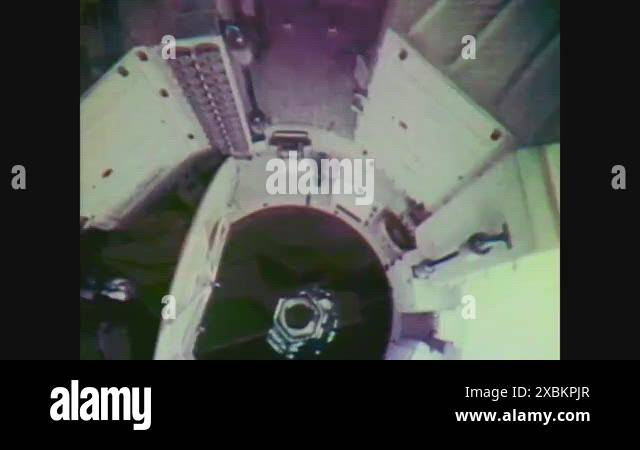 Astronauts Jack Robert Lousma, Owen Kay Garriott and Alan LaVern Bean activate systems and eat a ...