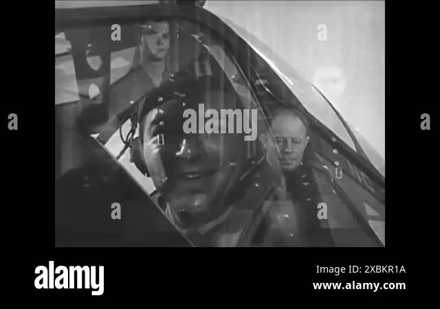 A United States Army Air Forces controller is shown in an operations ...